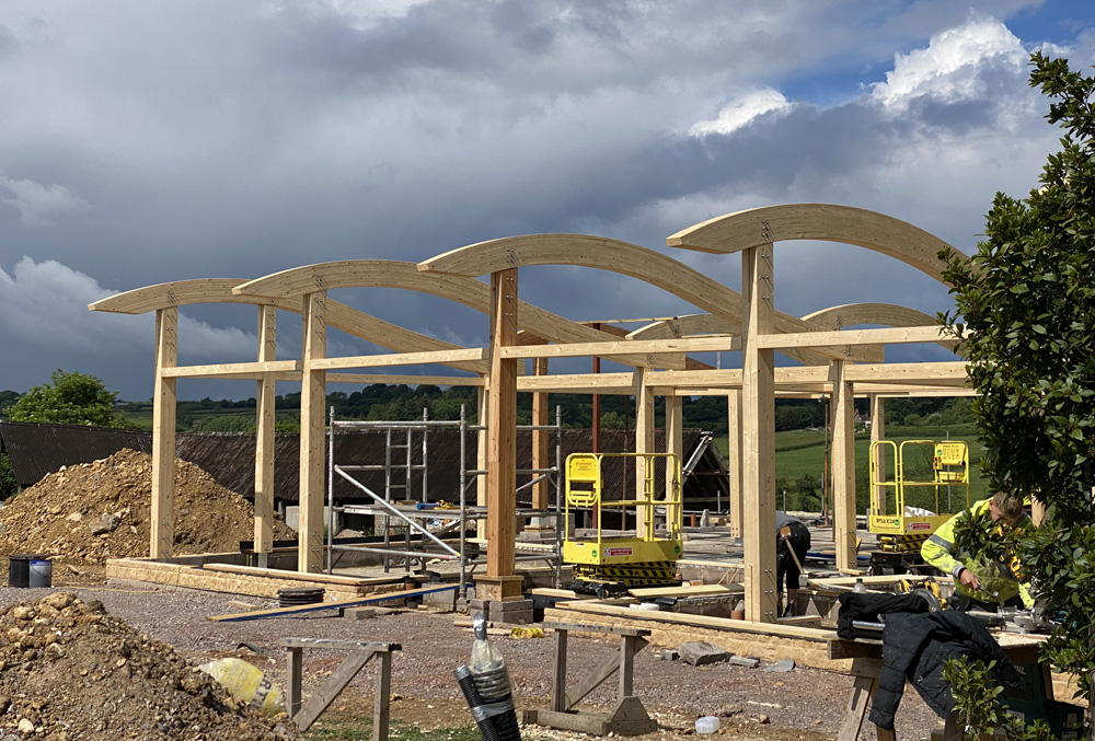 Curved glulam frame in Dorset - Batterham Smith Architects